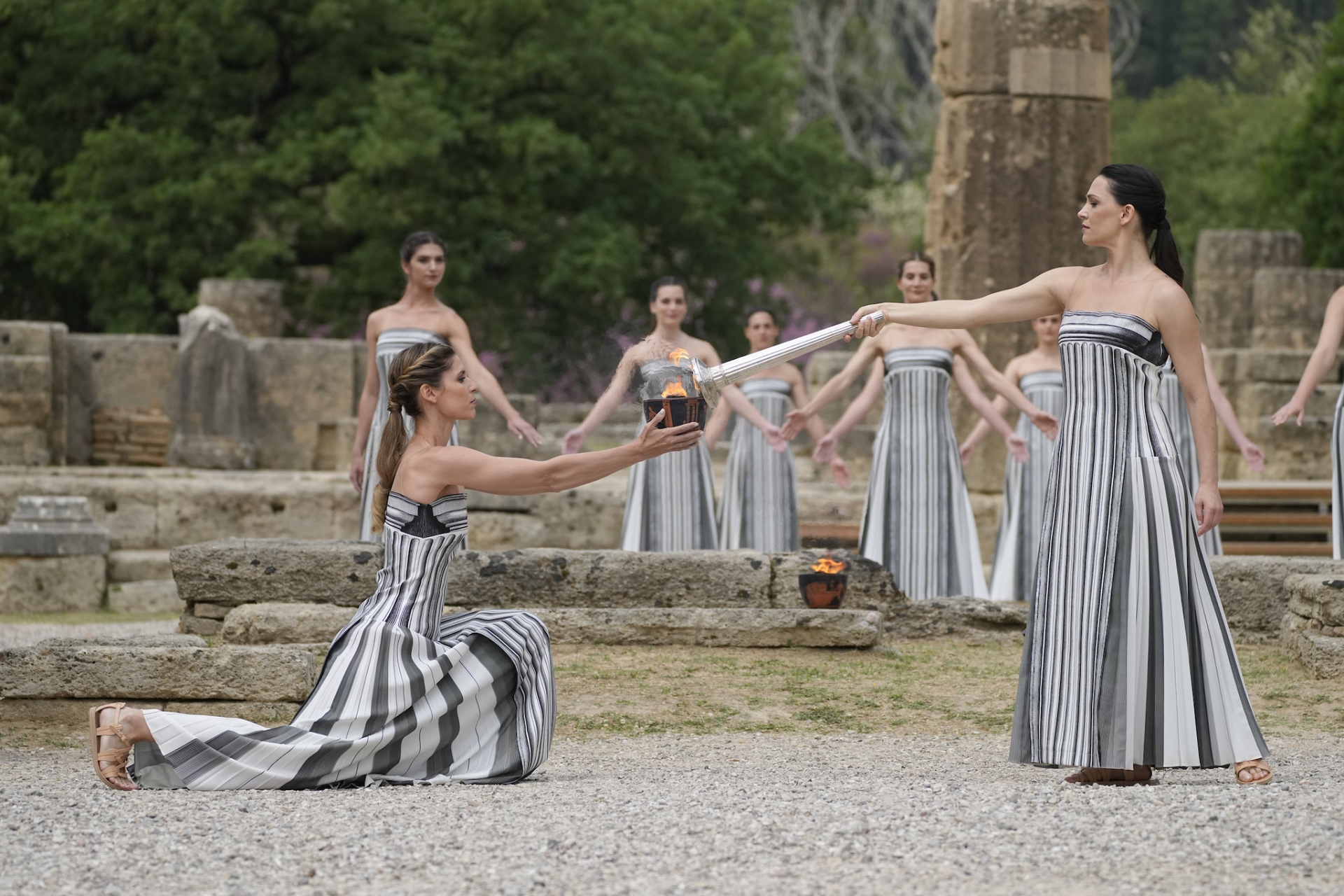 Olympic flame lit as Paris 2024 torch relay begins | ICF - Planet Canoe